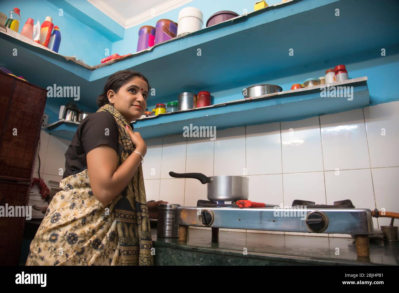 Indian woman cooking gas hi-res stock photography and images - Alamy