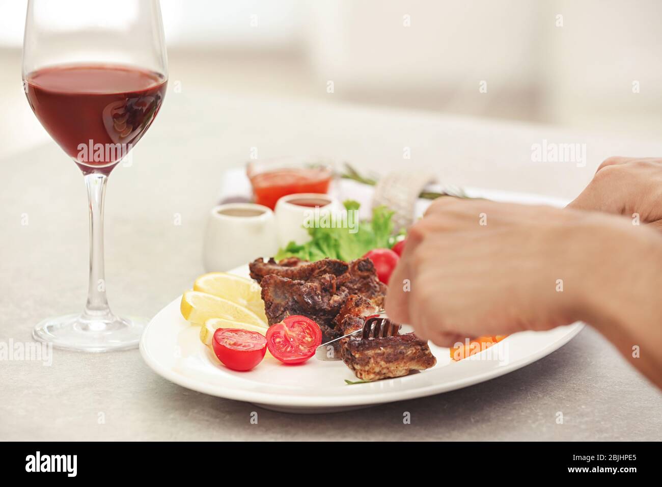 Man Eating Pork Ribs High Resolution Stock Photography and Images - Alamy