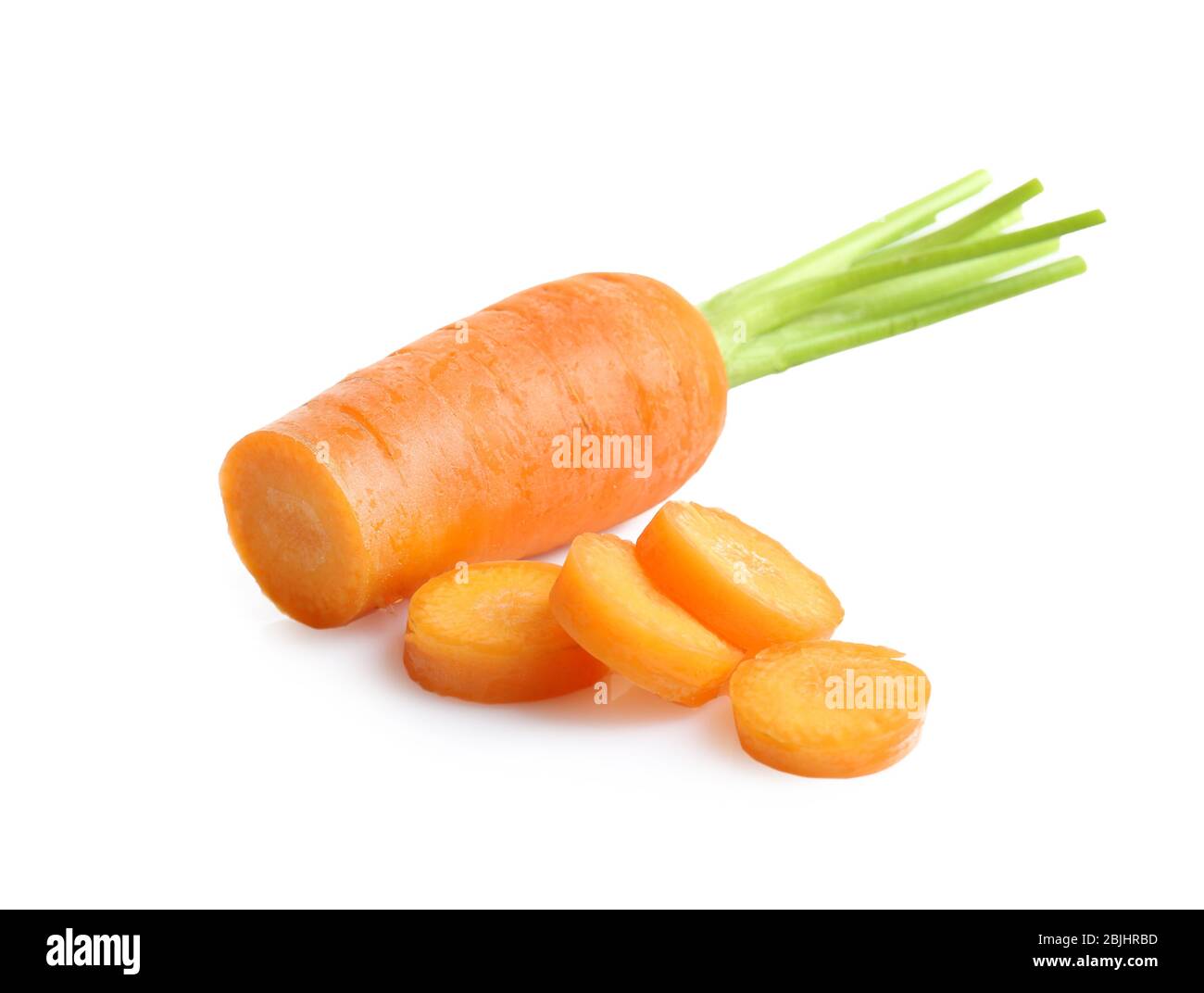 Fresh cut carrot isolated on white Stock Photo - Alamy