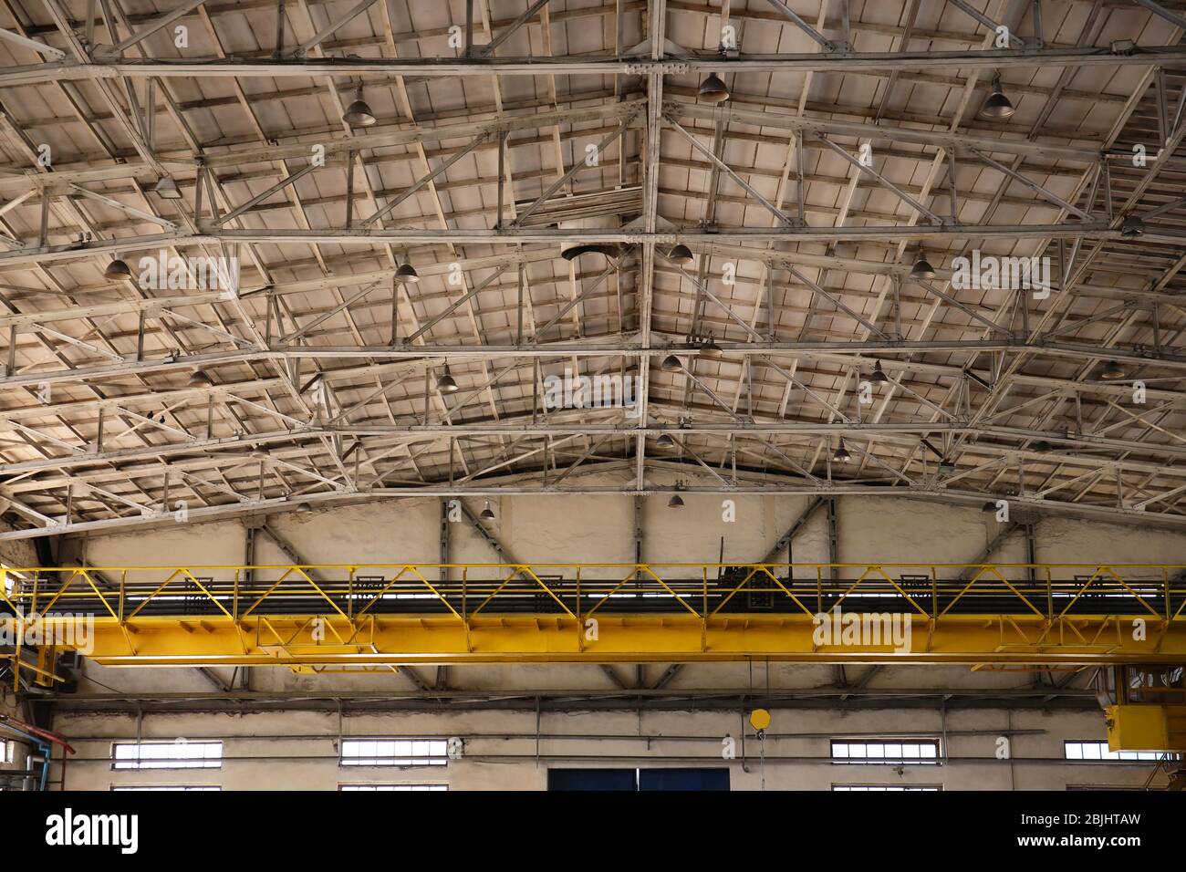 Ceiling of factory workshop with overhead crane Stock Photo - Alamy
