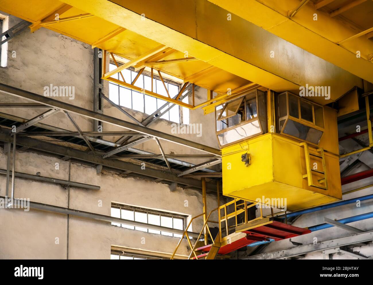 Overhead crane in factory workshop Stock Photo - Alamy