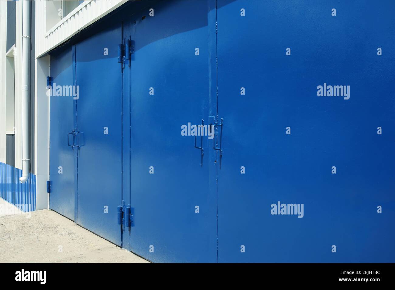 Doors of modern workshop Stock Photo - Alamy