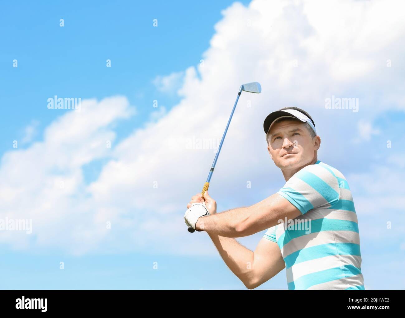 Man on golf range hi-res stock photography and images - Alamy