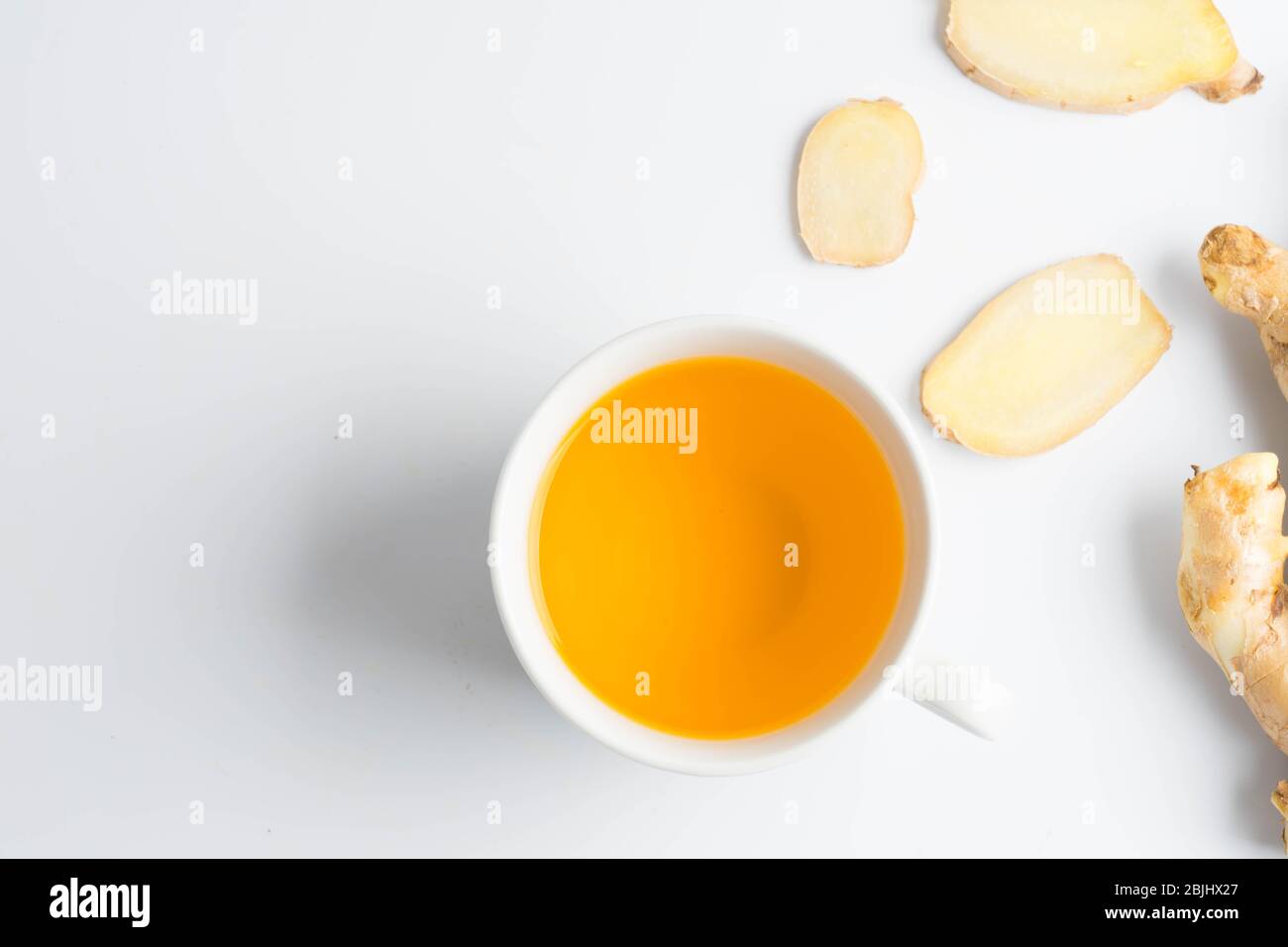 hot ginger tea ginger ale ginger beer in glass with ginger slice on ...