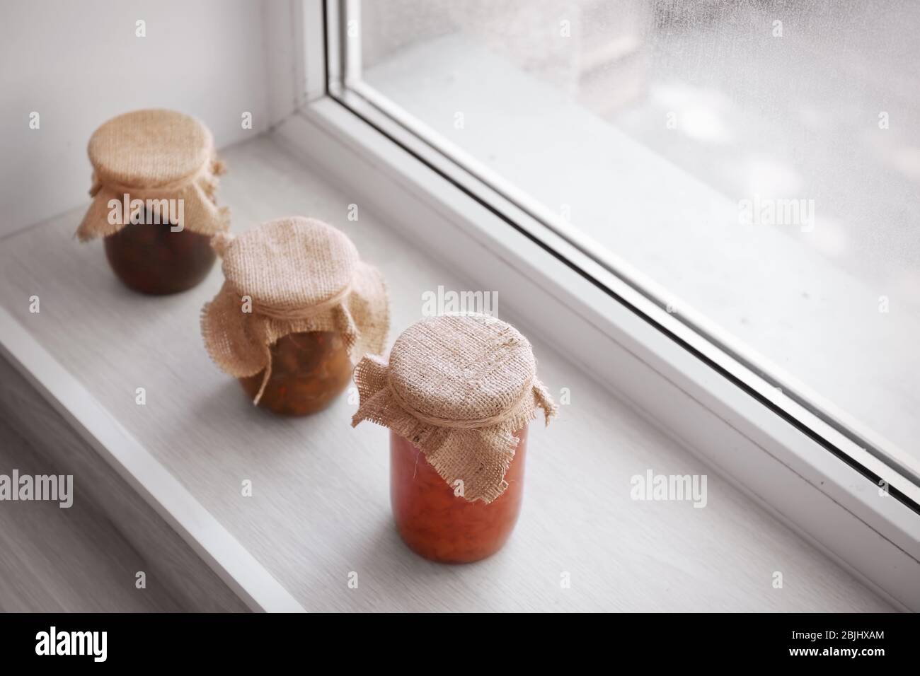 Jars on windowsill hi-res stock photography and images - Alamy