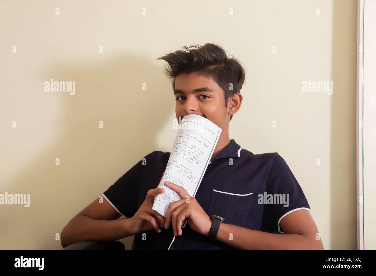 Indian boy sitting chair hi-res stock photography and images - Alamy