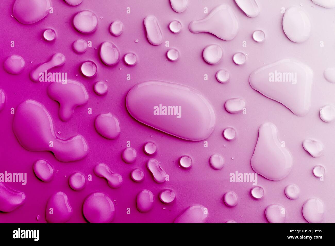 water drops on pink background Stock Photo - Alamy