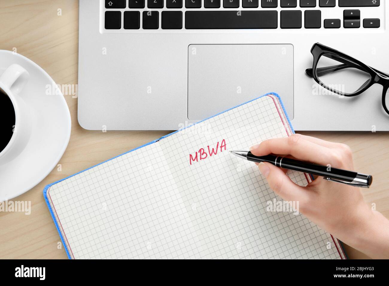 Female hand writing text in notebook. Management concept Stock Photo ...