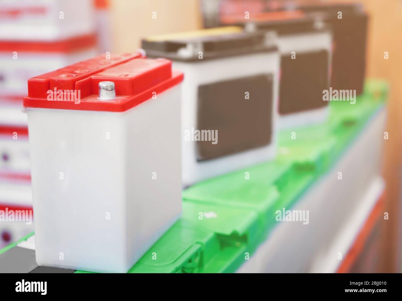Power car batteries presented in store Stock Photo - Alamy