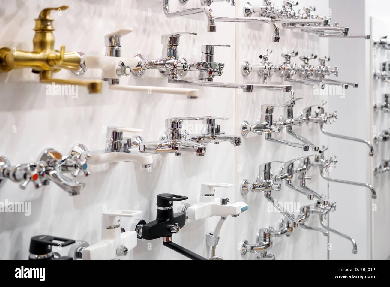 Varieties of water taps presented in store Stock Photo - Alamy
