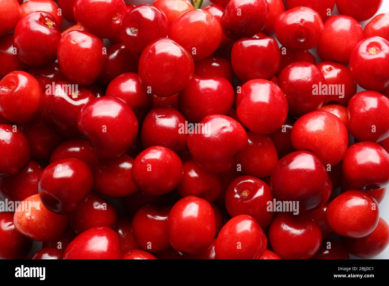Sweet red cherries, closeup Stock Photo - Alamy