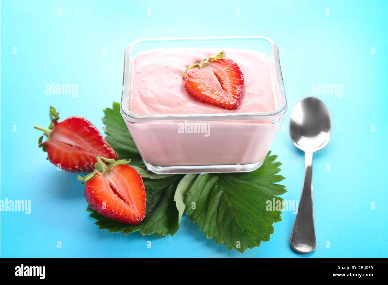Homemade strawberry yogurt on color background Stock Photo - Alamy