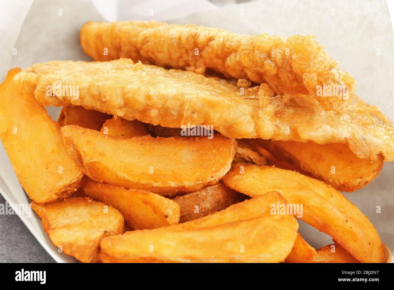 Traditional fish chips in box hi-res stock photography and images - Alamy