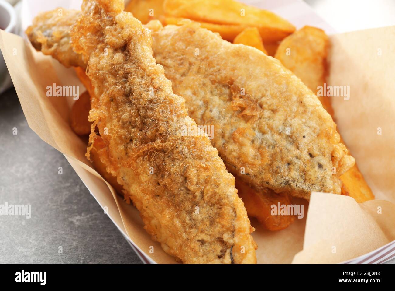 Fish and chips box table hi-res stock photography and images - Alamy