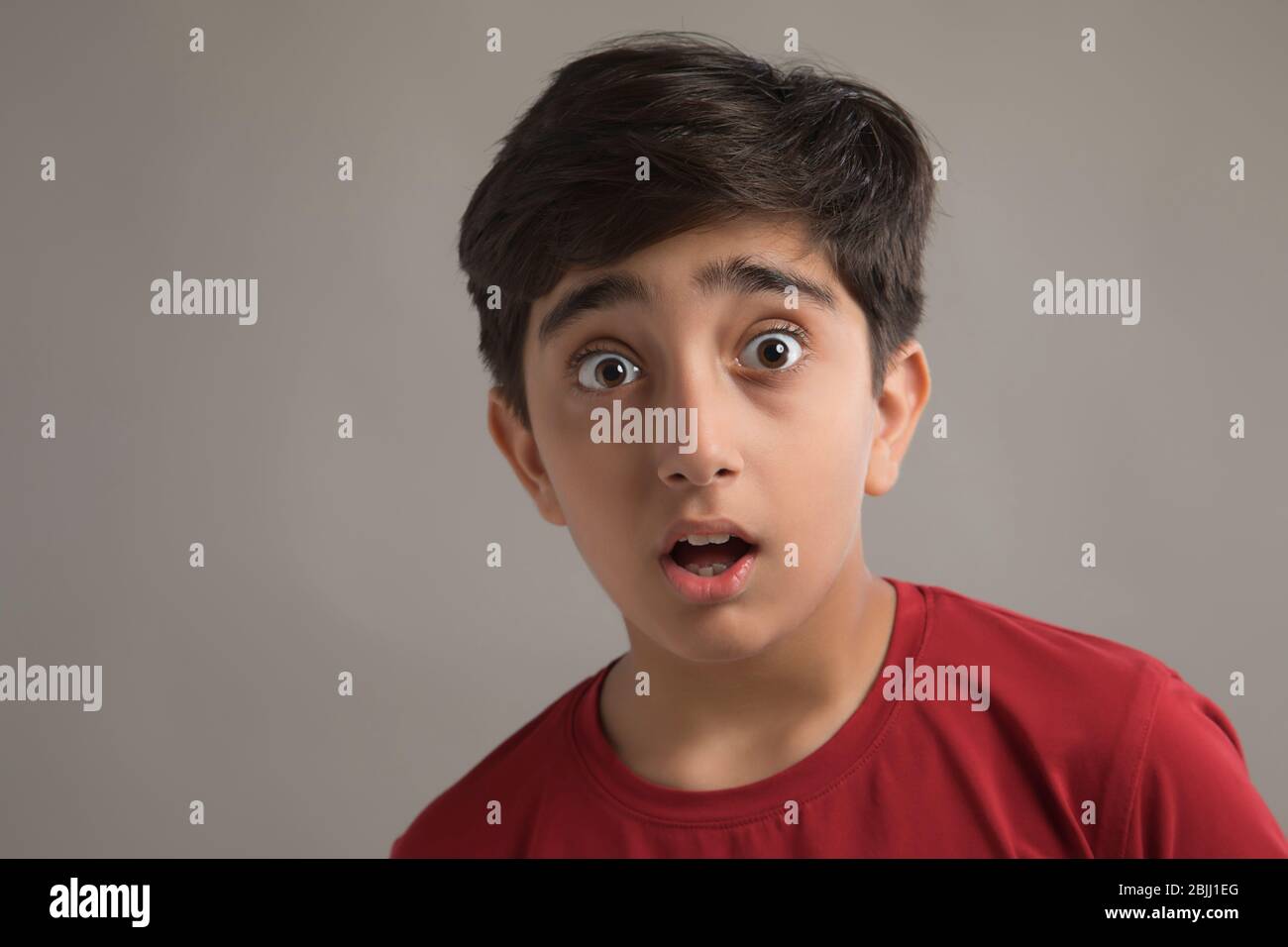 Portrait of a shocked young boy. (Children Stock Photo - Alamy