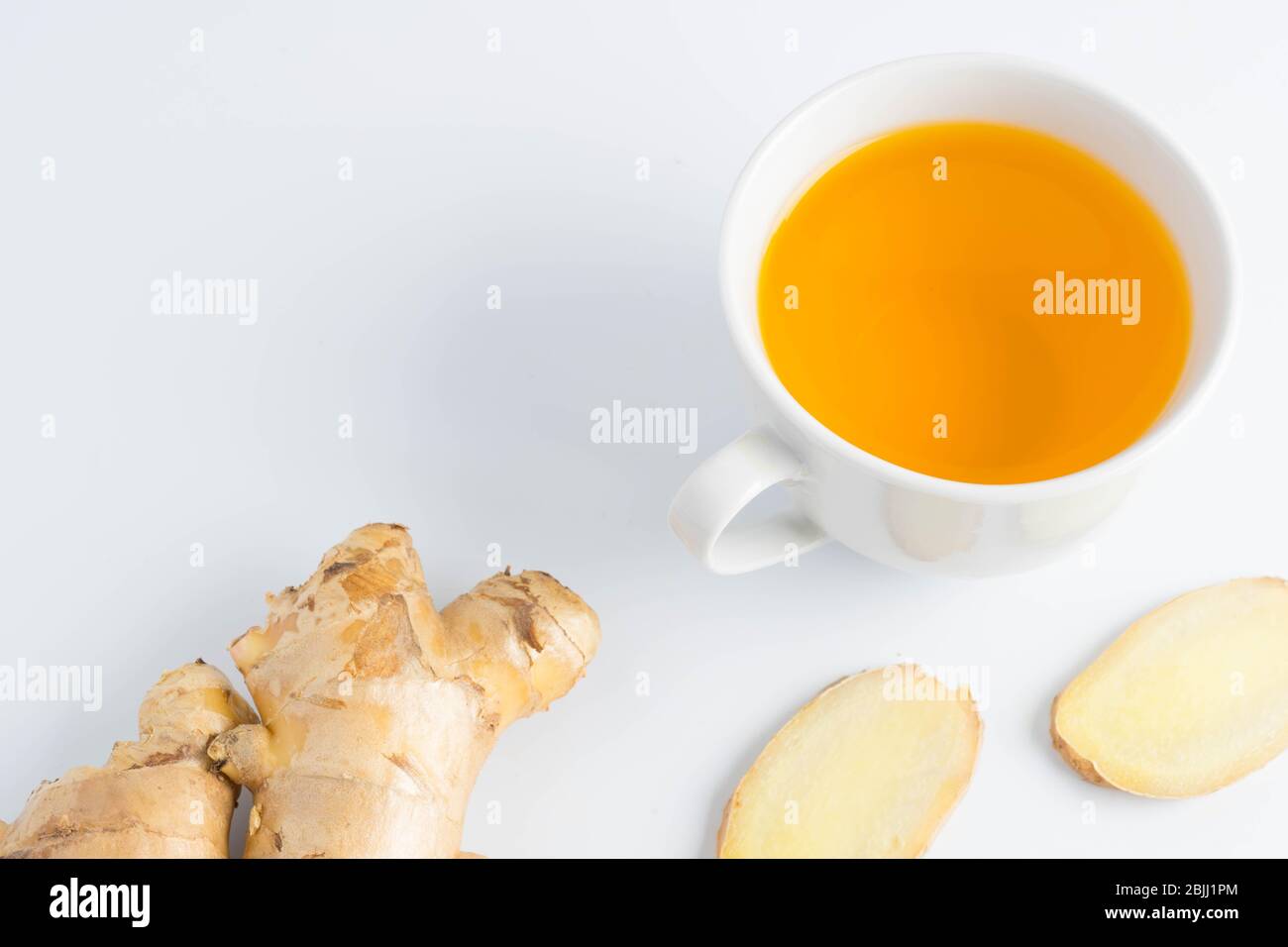 hot ginger tea ginger ale ginger beer in glass with ginger slice on ...