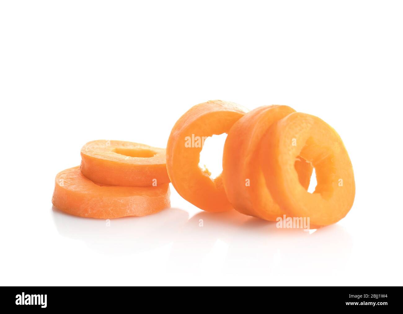 Fresh organic carrot in the shape of circle on white background Stock ...