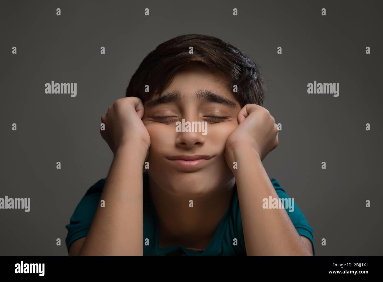 Portrait of a tired young boy. (Children Stock Photo - Alamy