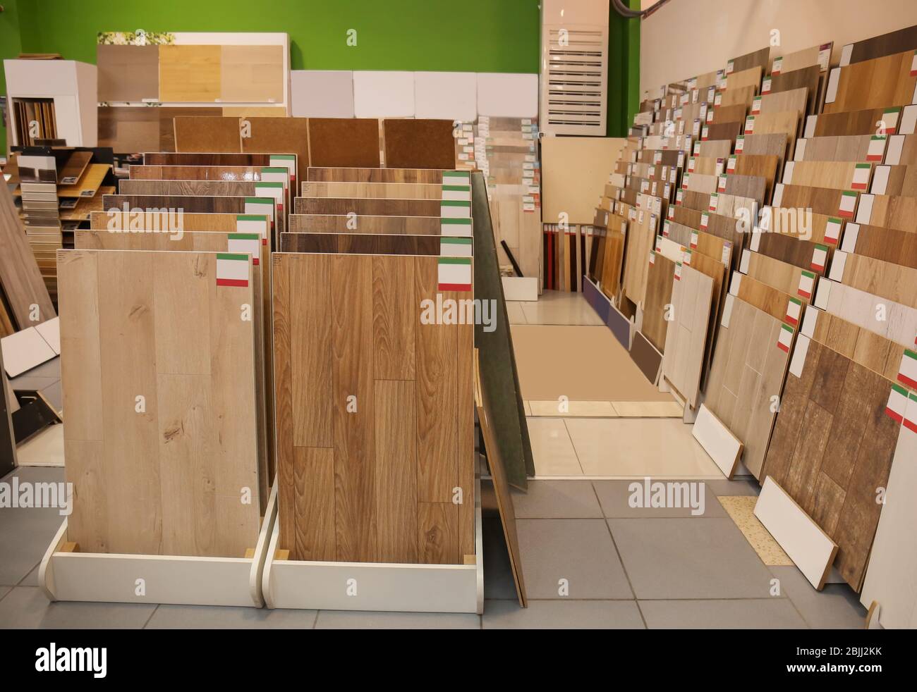 Assortment of laminated flooring samples in hardware store Stock Photo ...