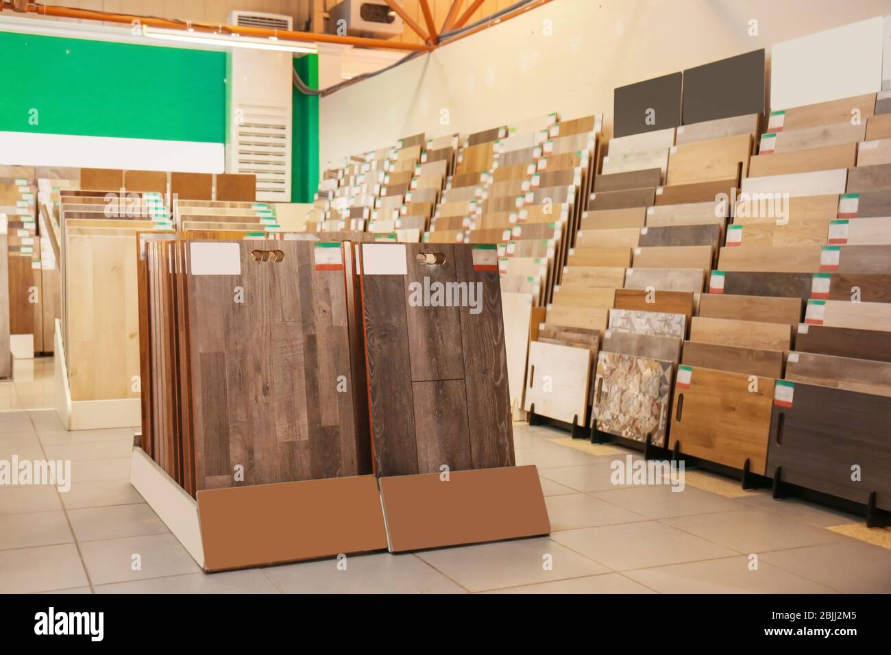 Assortment of laminated flooring samples in hardware store Stock Photo ...