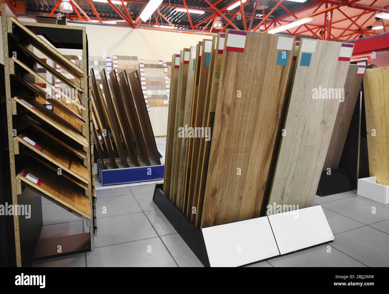 Assortment of laminated flooring samples in hardware store Stock Photo ...