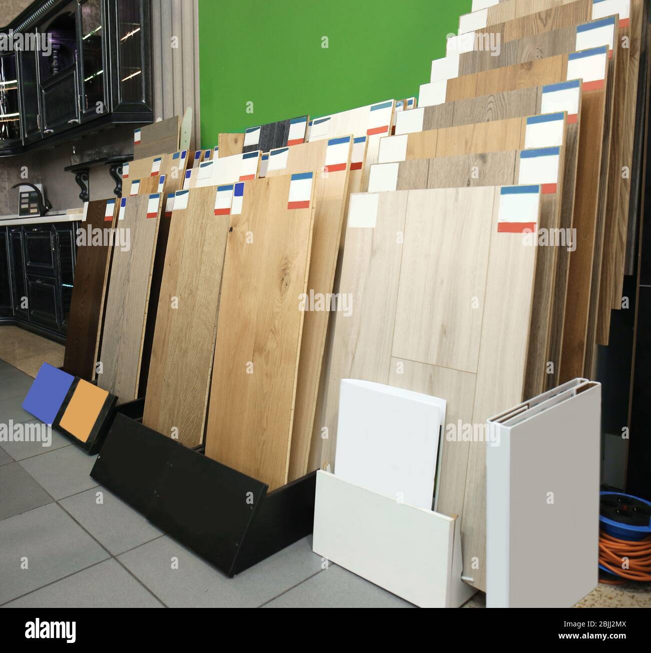 Assortment of laminated flooring samples in hardware store Stock Photo ...
