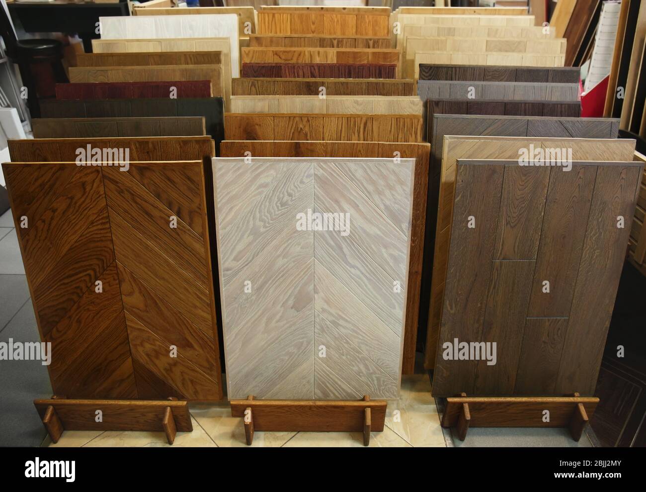 Assortment of laminated flooring samples in hardware store Stock Photo ...