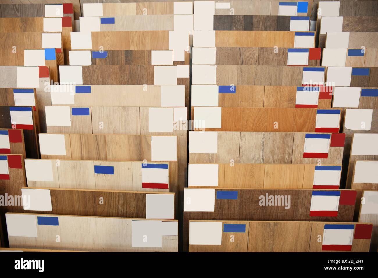 Assortment of laminated flooring samples in hardware store Stock Photo ...
