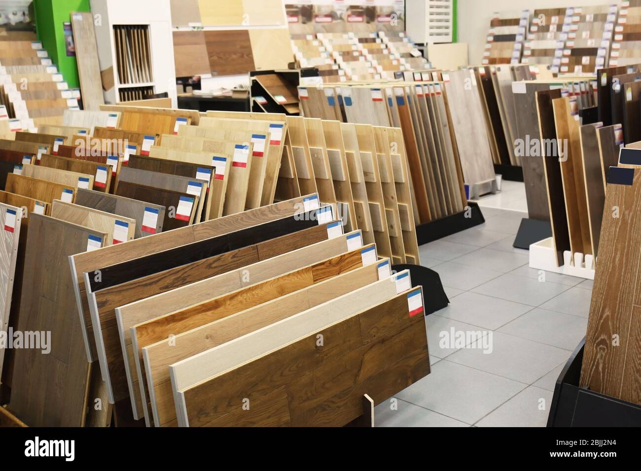 Assortment of laminated flooring samples in hardware store Stock Photo ...