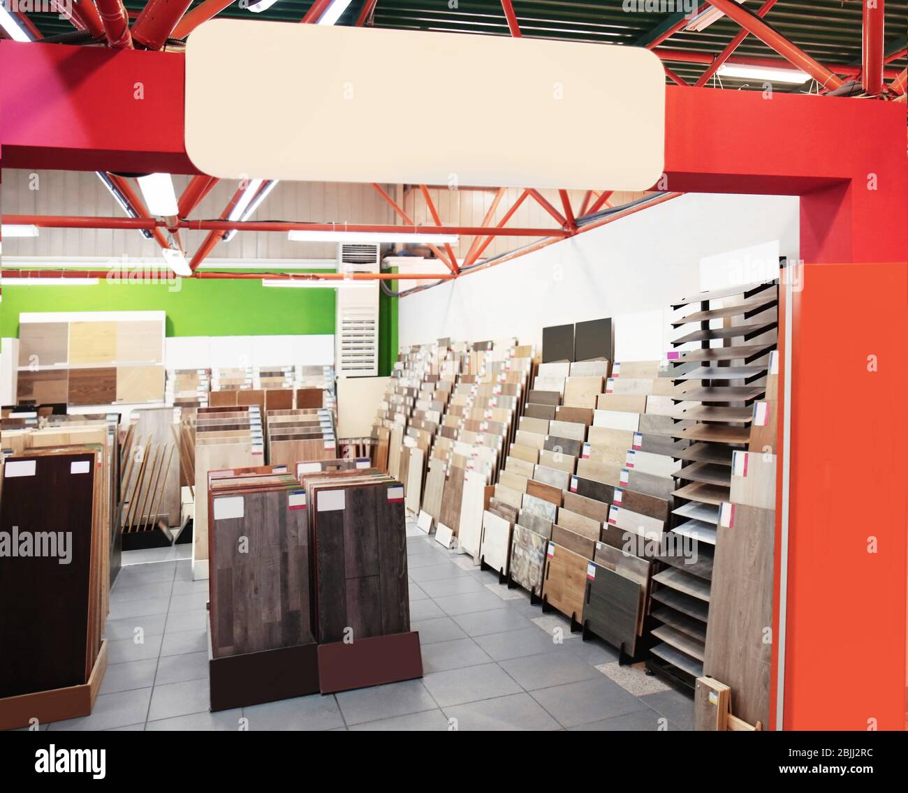 Assortment of laminated flooring samples in hardware store Stock Photo ...