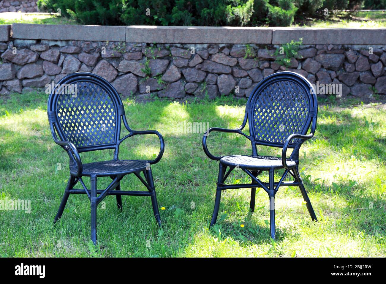 Two chairs sit on grass hi-res stock photography and images - Alamy
