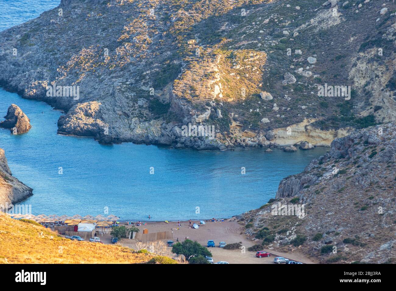 The famous rocky beach Melidoni at sunset. Amazing scenery with crystal ...