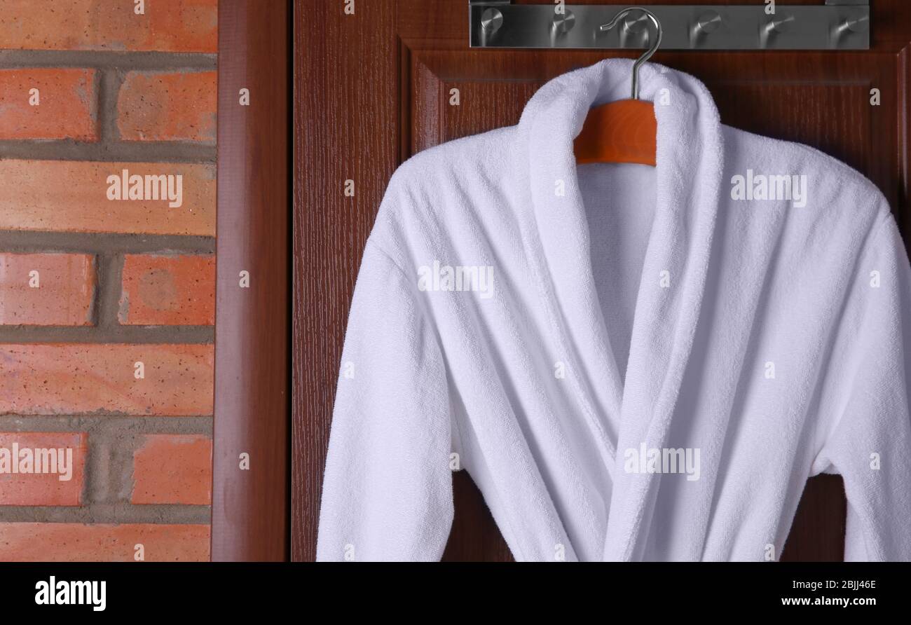 Robe hanging on door hi-res stock photography and images - Alamy