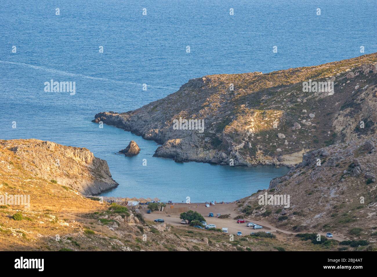 The famous rocky beach Melidoni at sunset. Amazing scenery with crystal ...