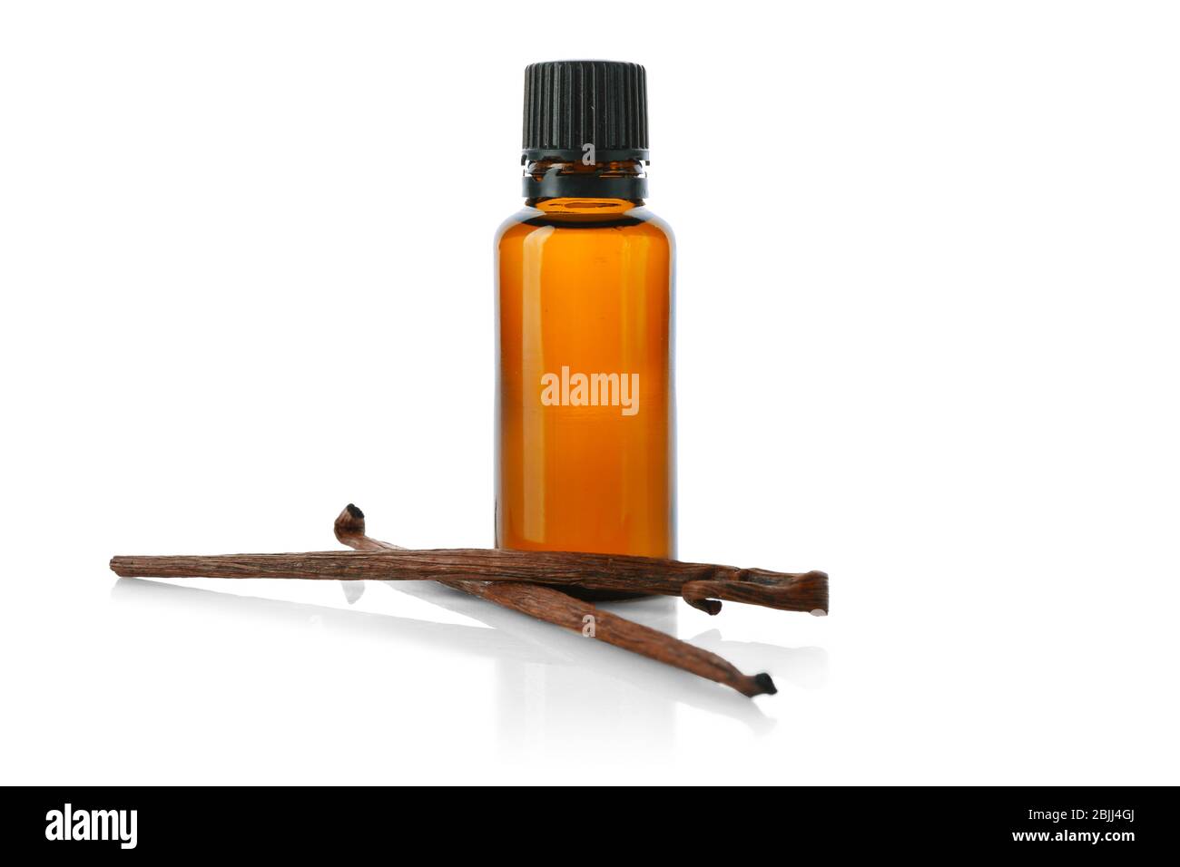 Bottle with vanilla extract and sticks on white background Stock Photo ...