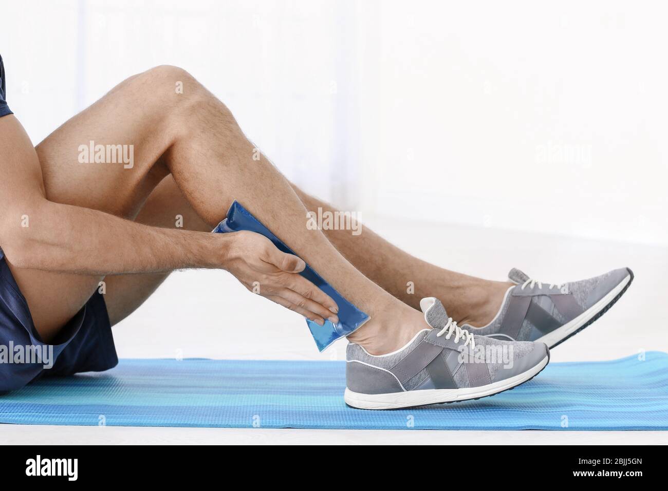 Young man applying medical hi-res stock photography and images - Alamy