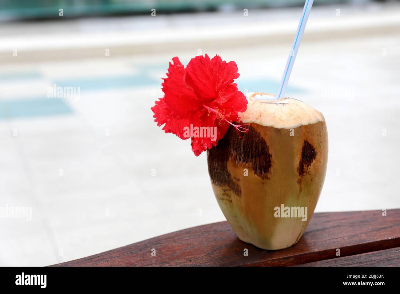 Fresh coconut cocktail at resort Stock Photo - Alamy