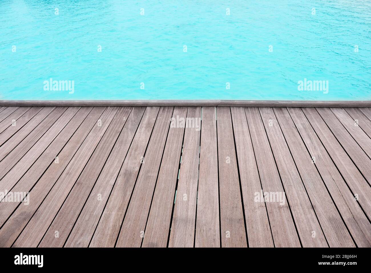 Wooden pontoon at sea resort. Summer vacation concept Stock Photo - Alamy