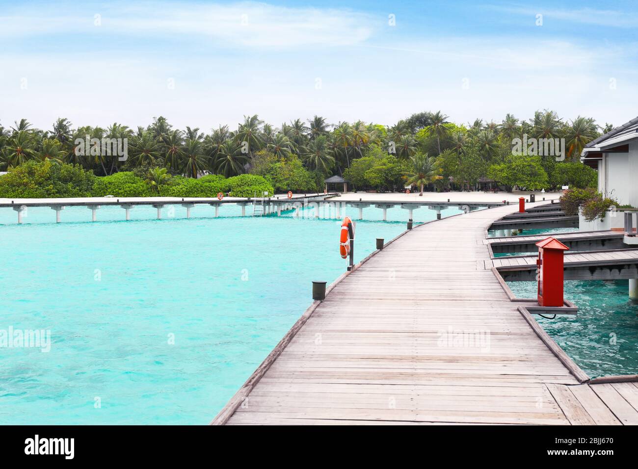 Wooden pontoon bridge at tropical resort Stock Photo - Alamy