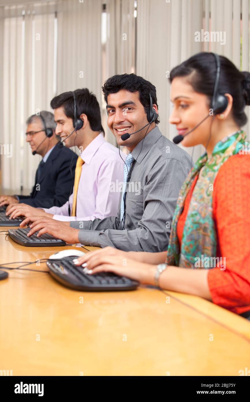 Portrait of a call center agent Stock Photo - Alamy