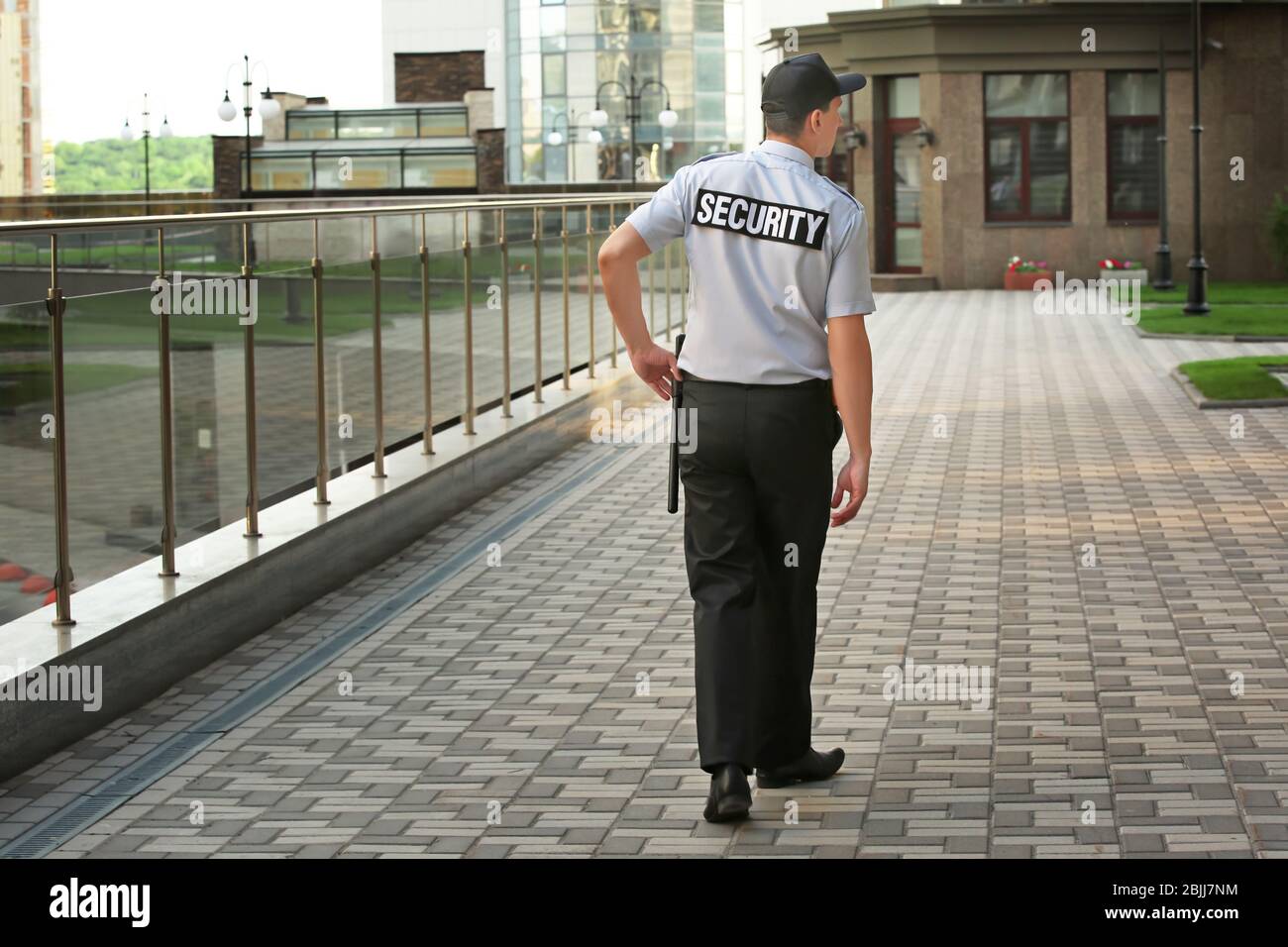 Male security guard, outdoors Stock Photo - Alamy
