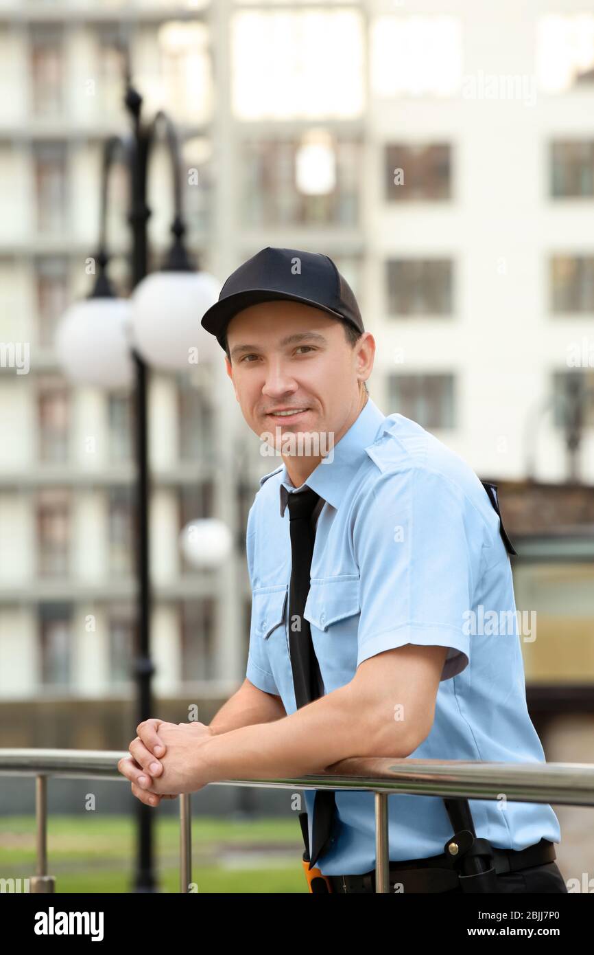 Male security guard, outdoors Stock Photo - Alamy