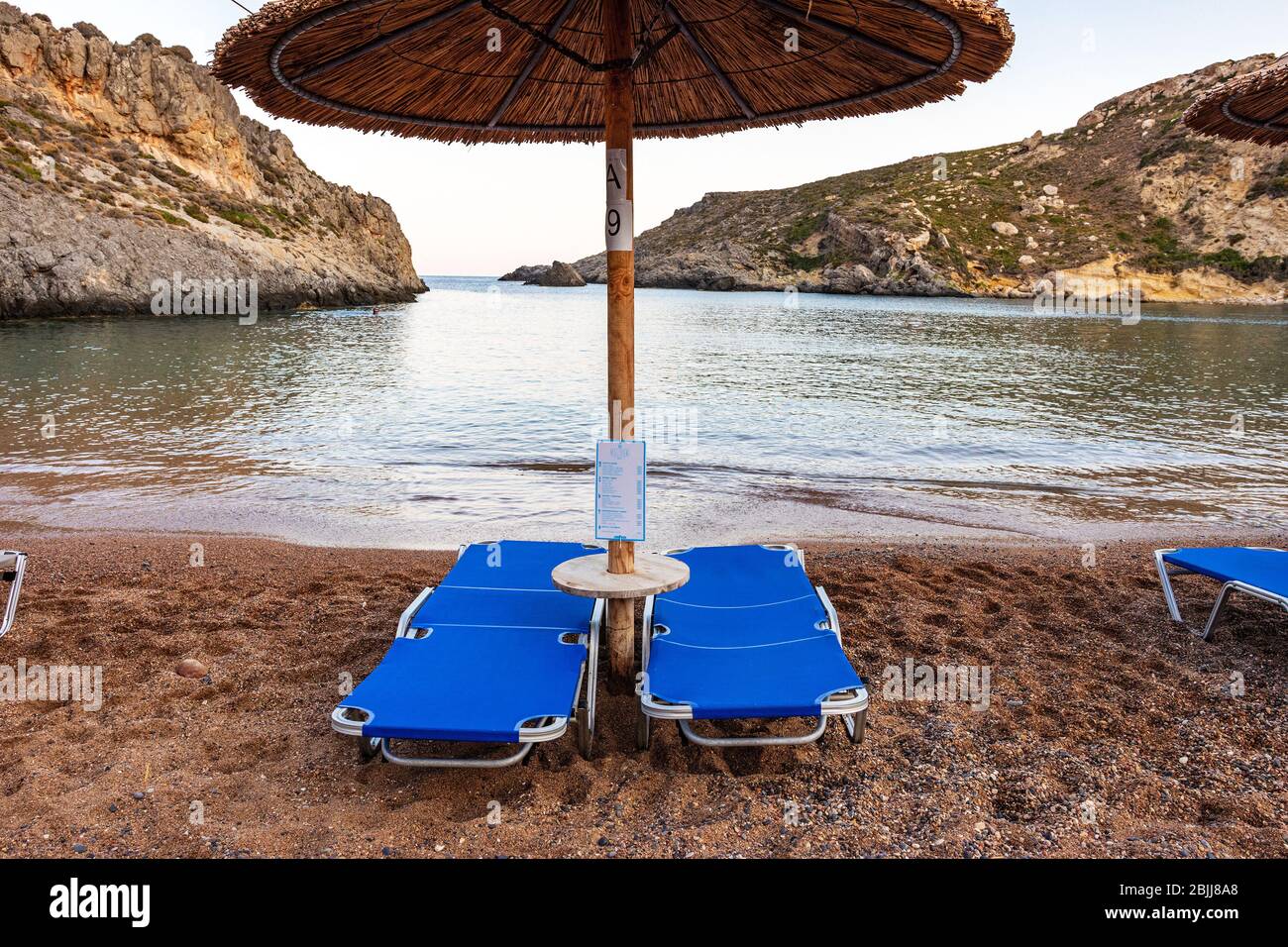The famous rocky beach Melidoni at sunset. Amazing scenery with crystal ...