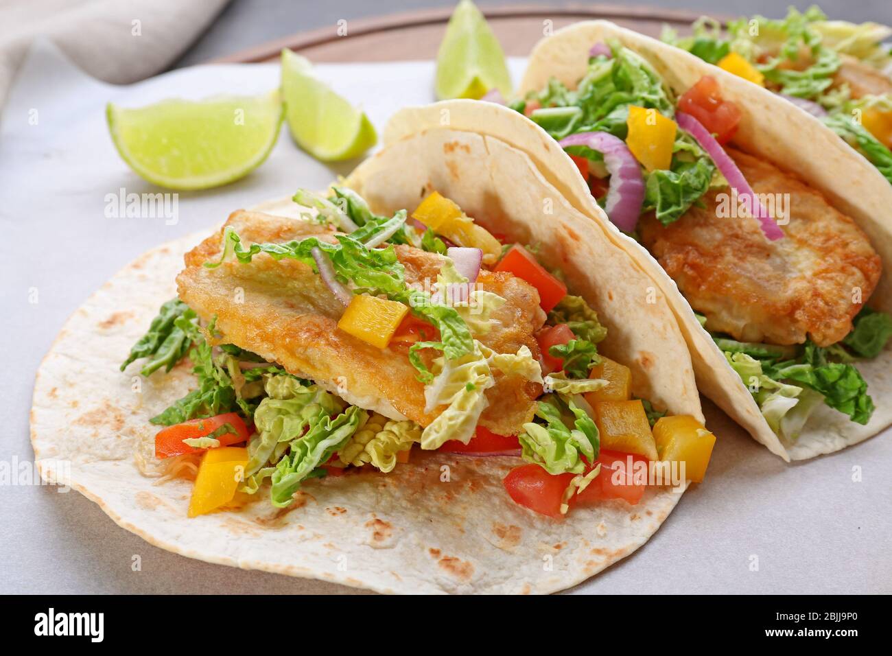 Delicious fish tacos on cooking sheet Stock Photo - Alamy