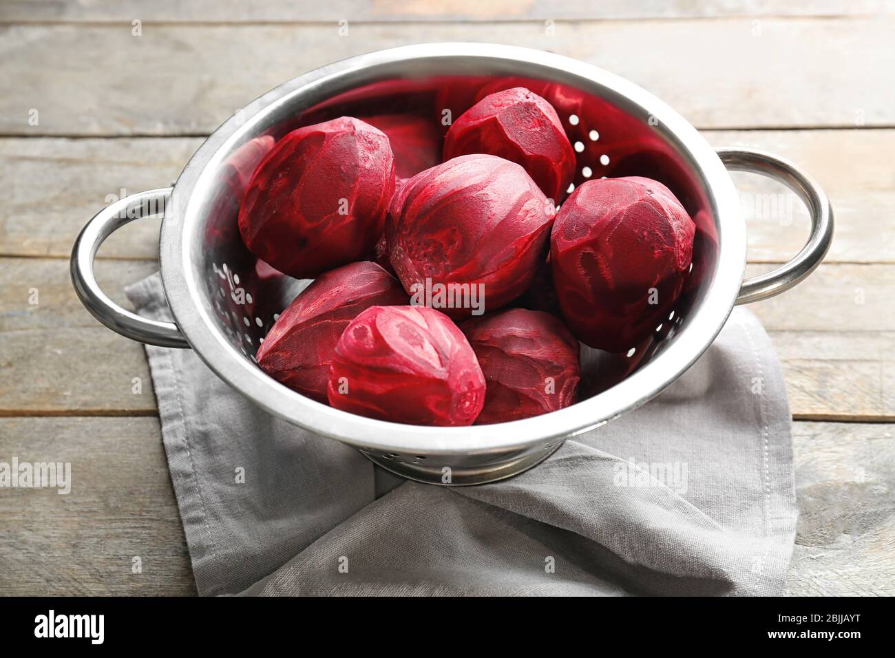 Peeled beets in strainer on table Stock Photo - Alamy