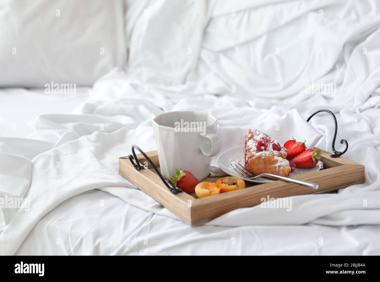Delicious breakfast on bed Stock Photo - Alamy