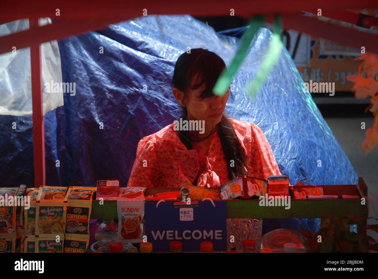 Lady selling small food items, Yangon, Myanmar, Asia Stock Photo - Alamy