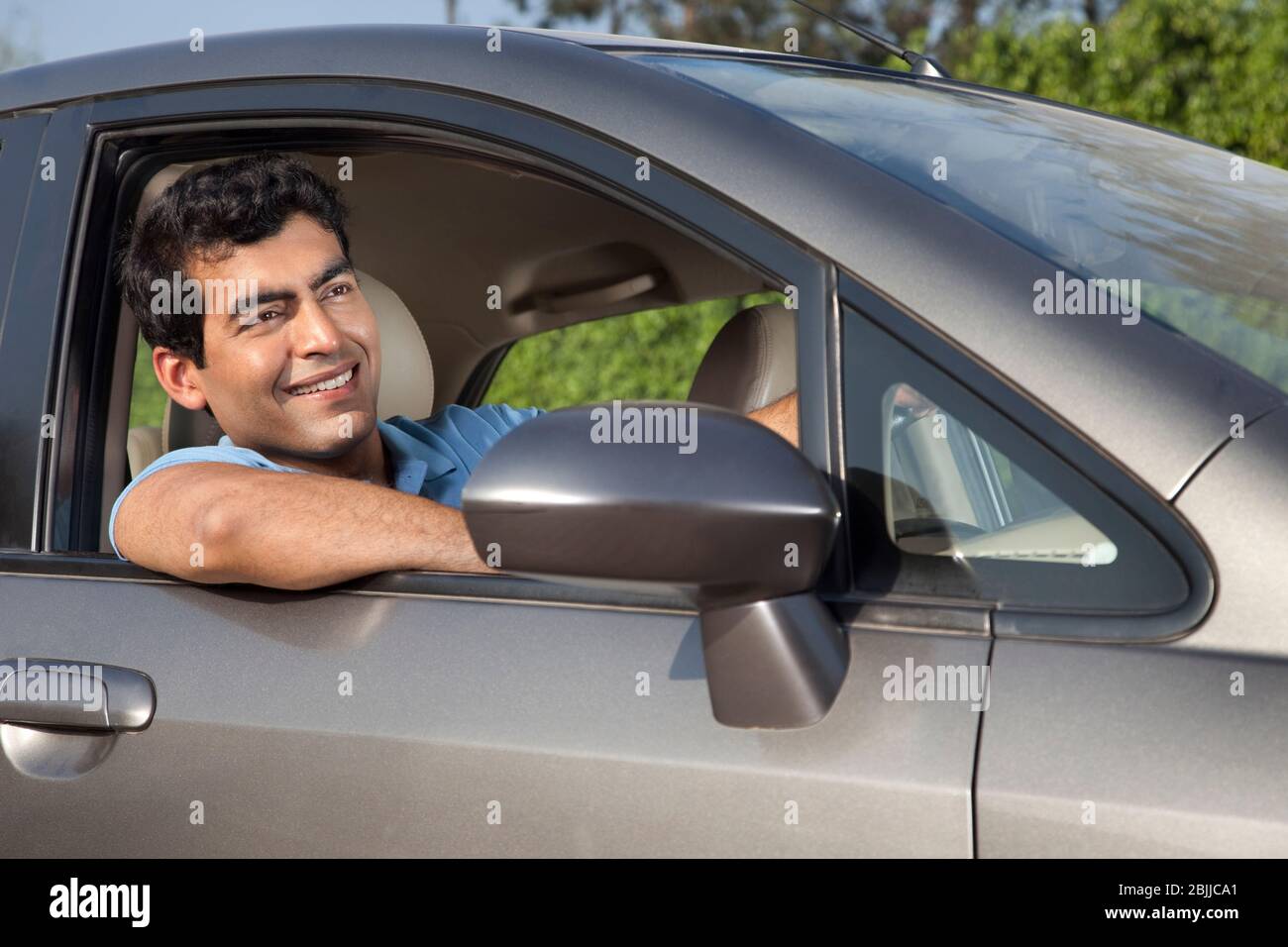 Close up of indian man sitting in car hi-res stock photography and ...