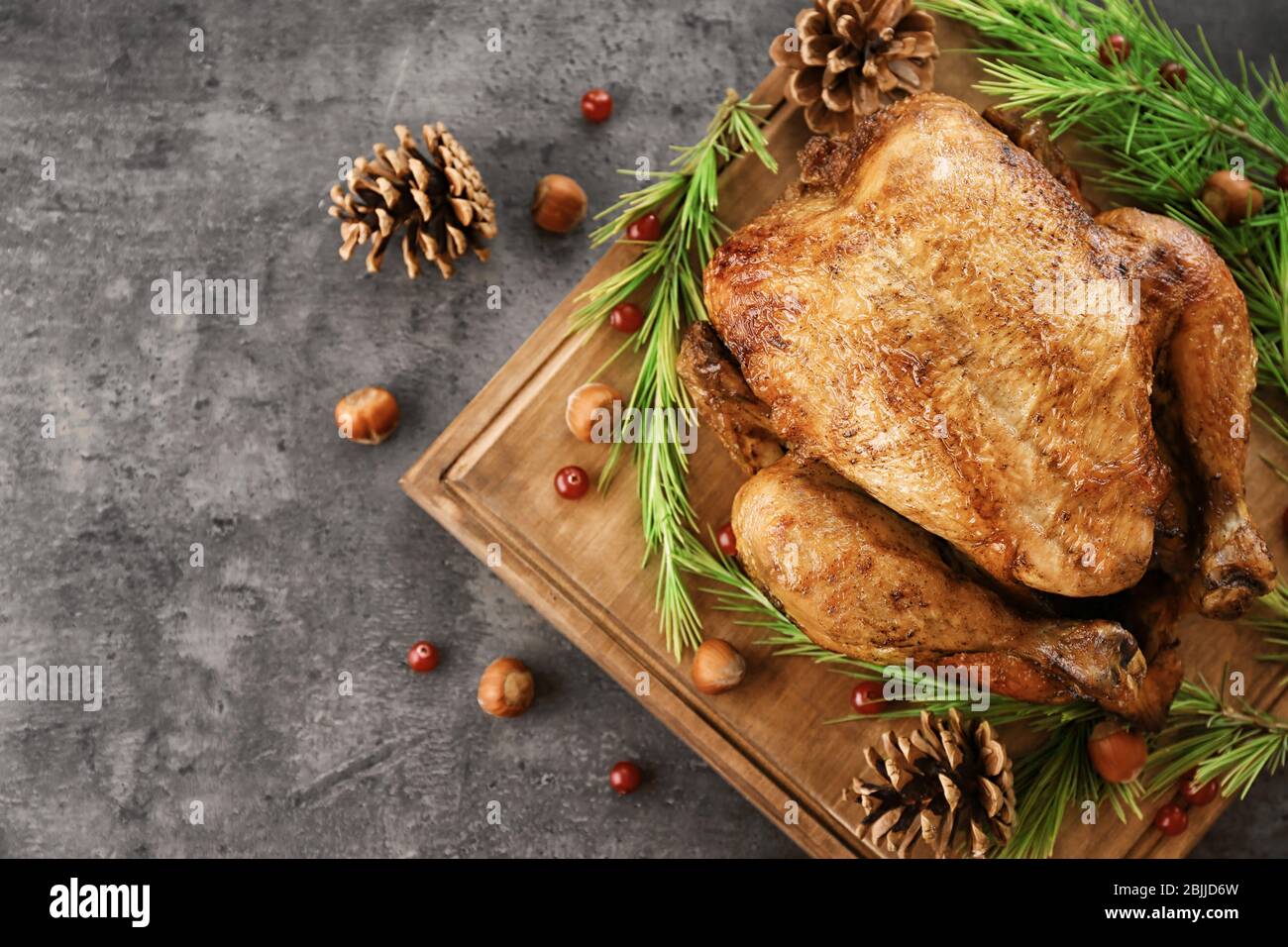 Composition with whole roasted turkey on grey background Stock Photo ...