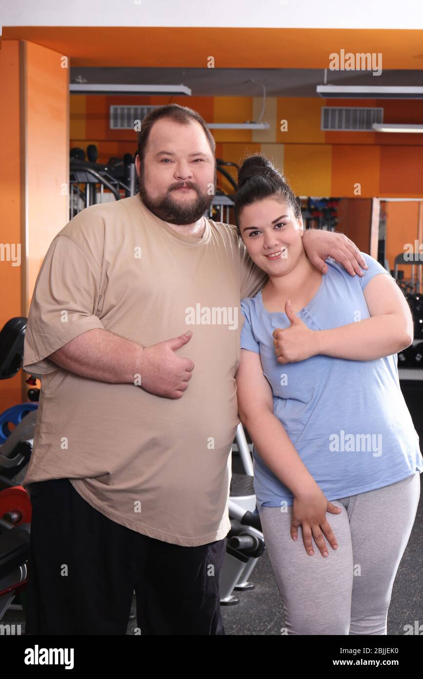 Overweight couple in gym Stock Photo - Alamy